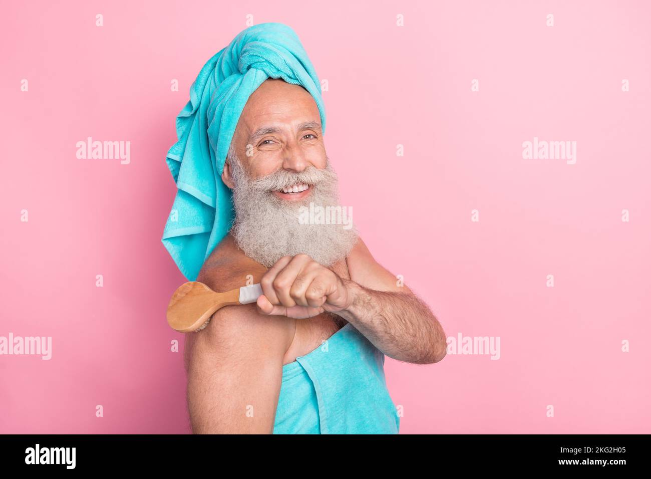 Photo of pensioner man take bath cleaning skin use massager brush ...