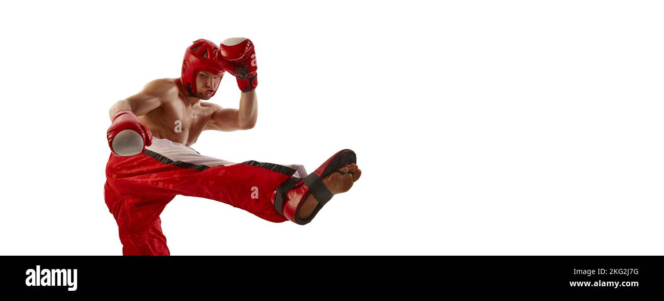 Dynamic portrait of young muscled athlete, professional kickboxer in ...