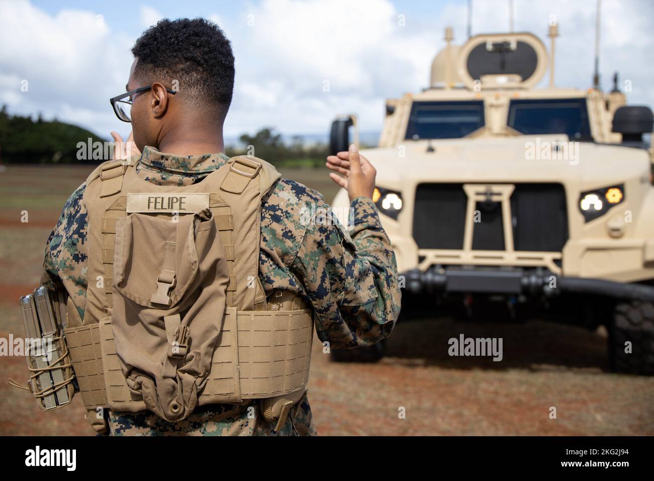 U.S. Marine Corps Lance Cpl. Ramon Felipe, radio operator, with 3d Marine Littoral Regiment, 3d ...