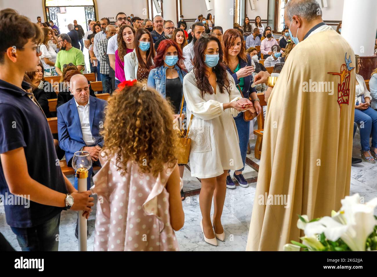 Maronite communion hi-res stock photography and images - Alamy