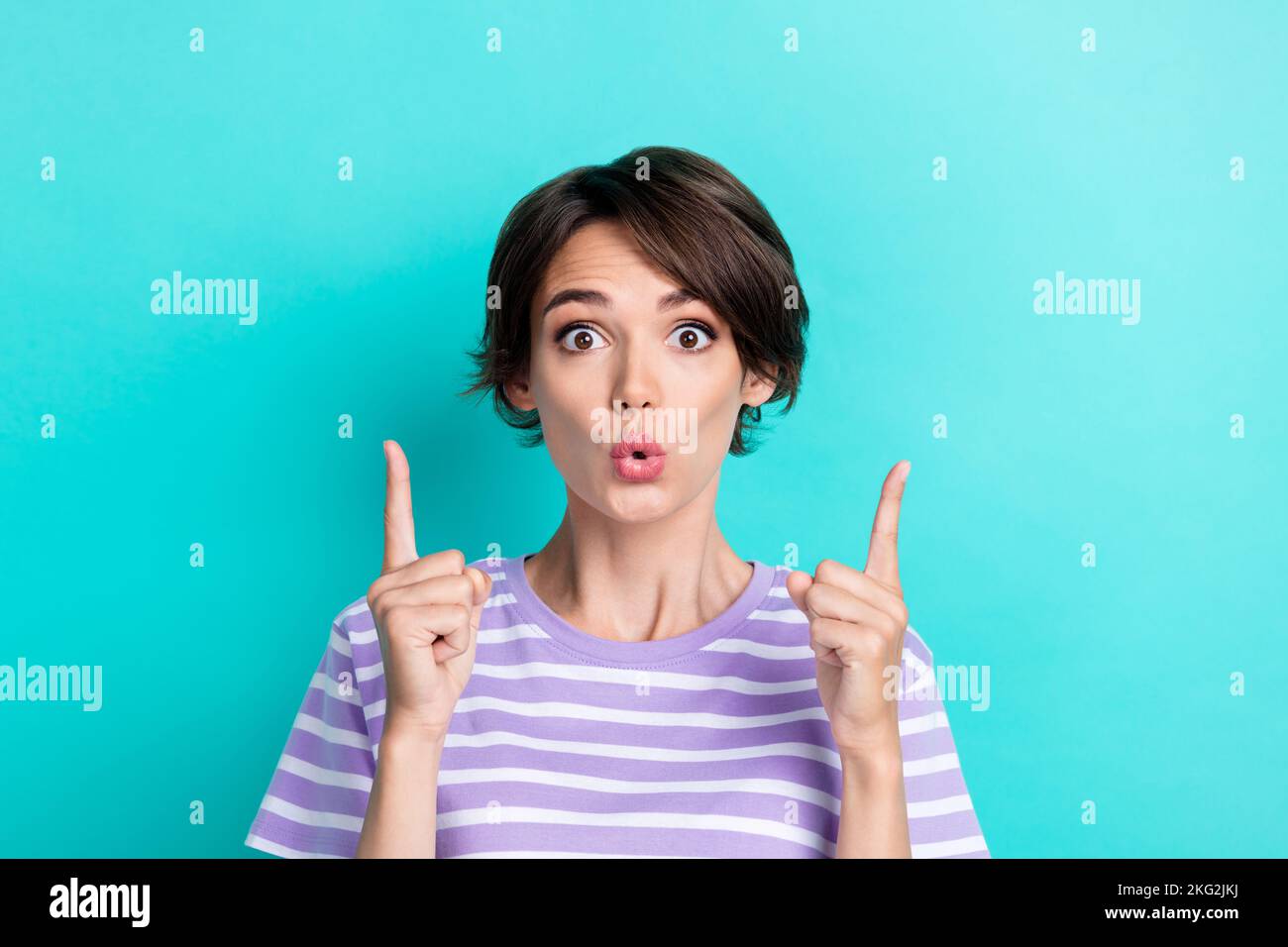 Portrait Of Positive Impressed Woman With Bob Hairdo Wear Striped T