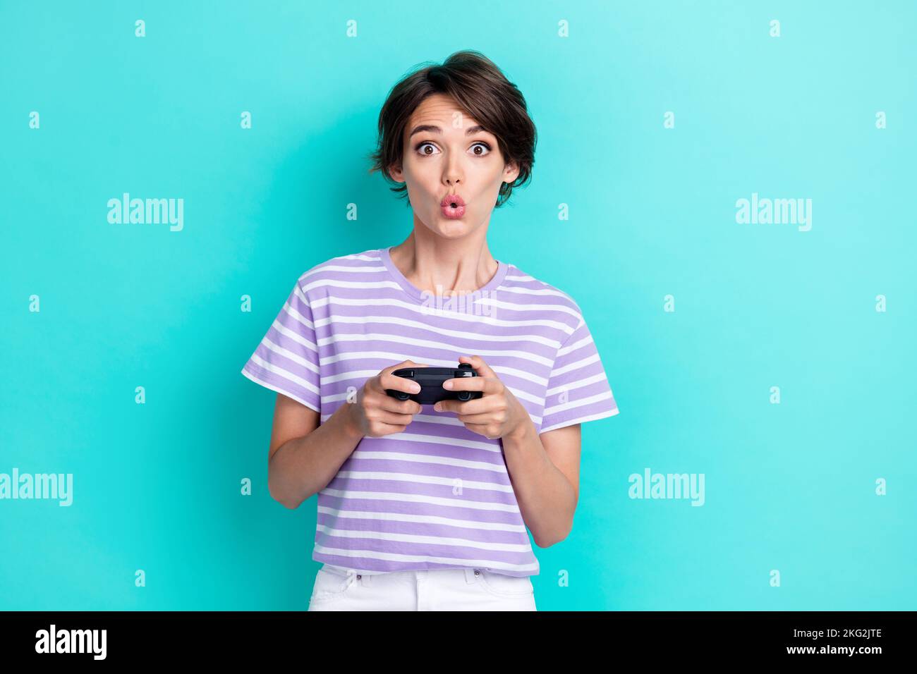 Photo of adorable impressed lady wear violet t-shirt playing ...