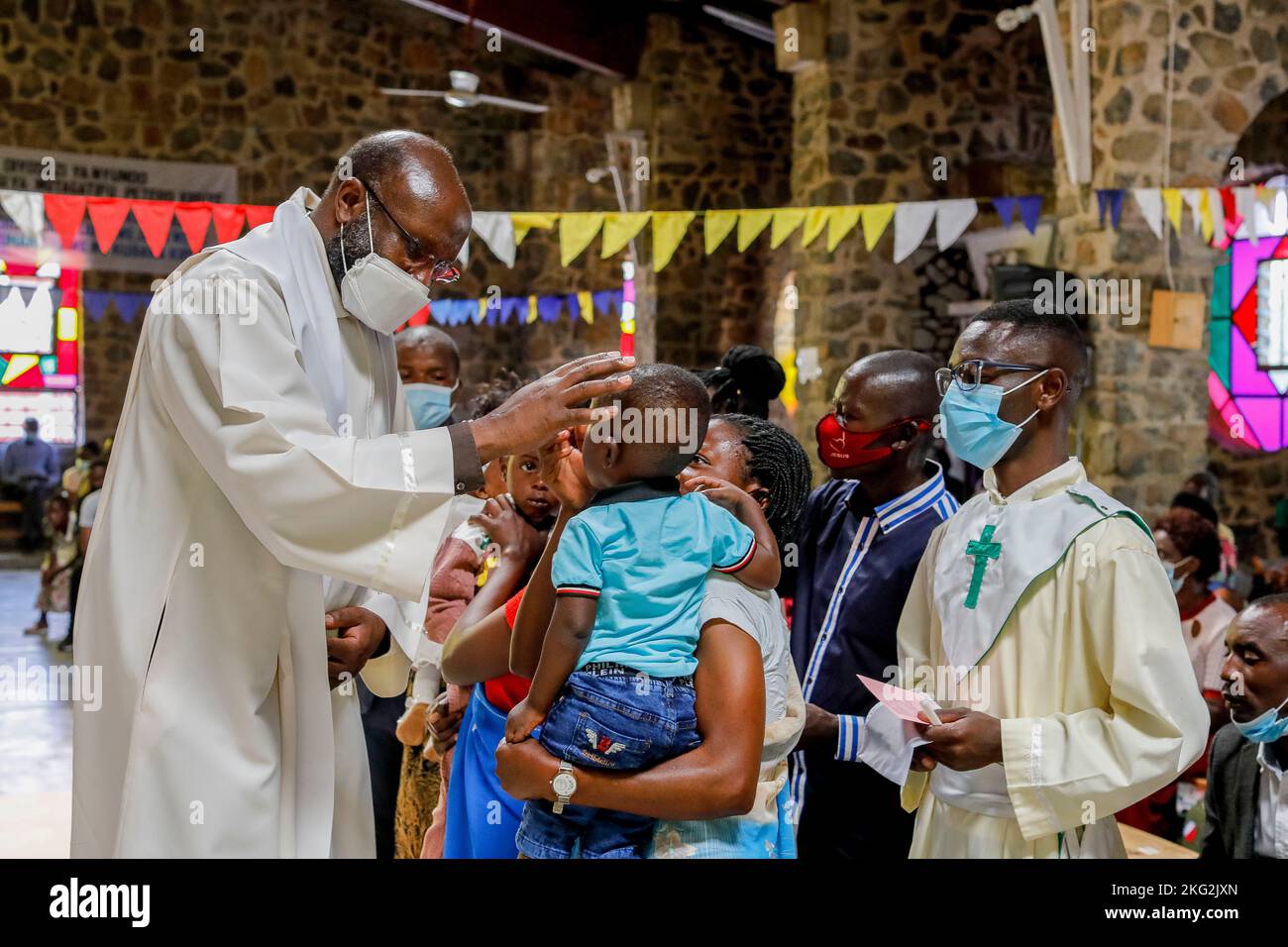 Sunday mass with baptisms in Karongi Genocide Memorial church, Kibuye ...