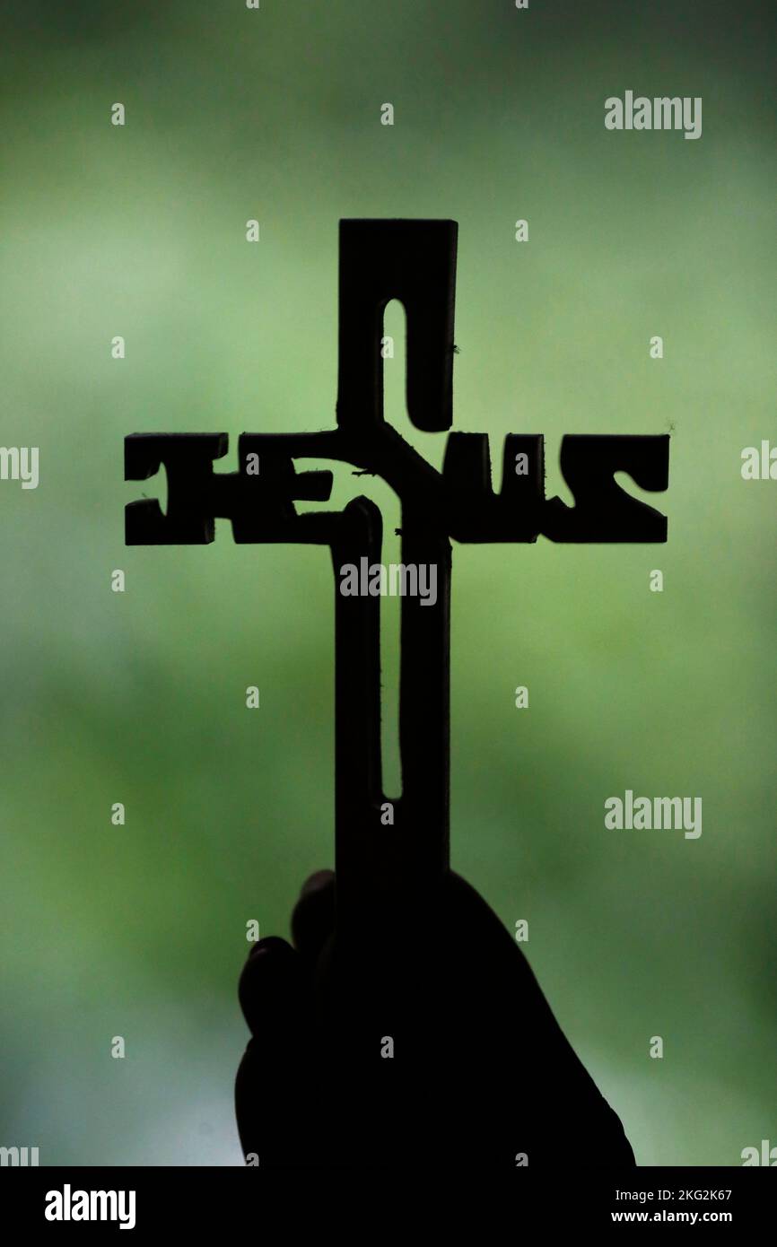 Holy bible and christian cross with the name of jesus. Faith and ...