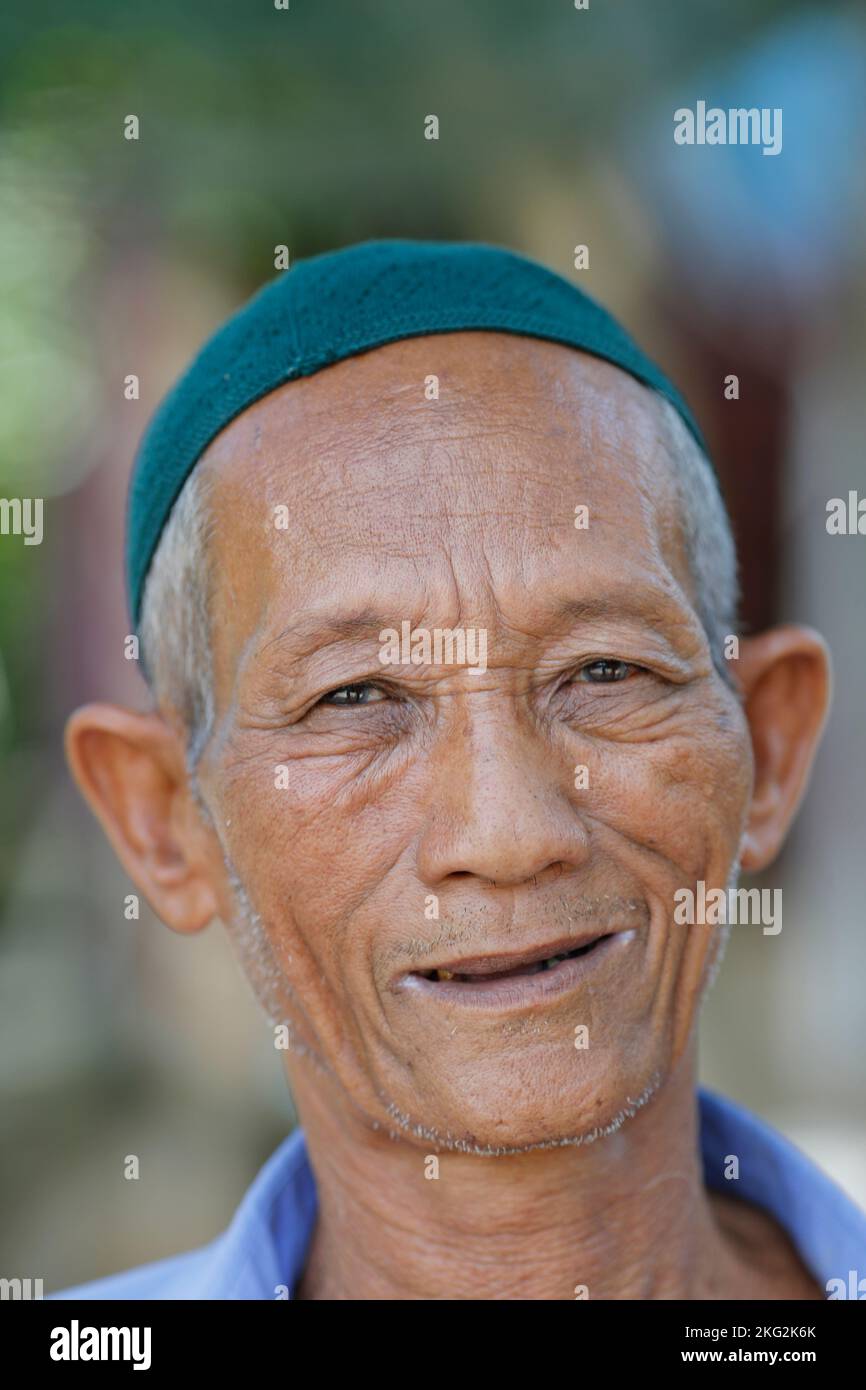 Portrait of smiling muslim man. Chau Doc. Vietnam Stock Photo - Alamy