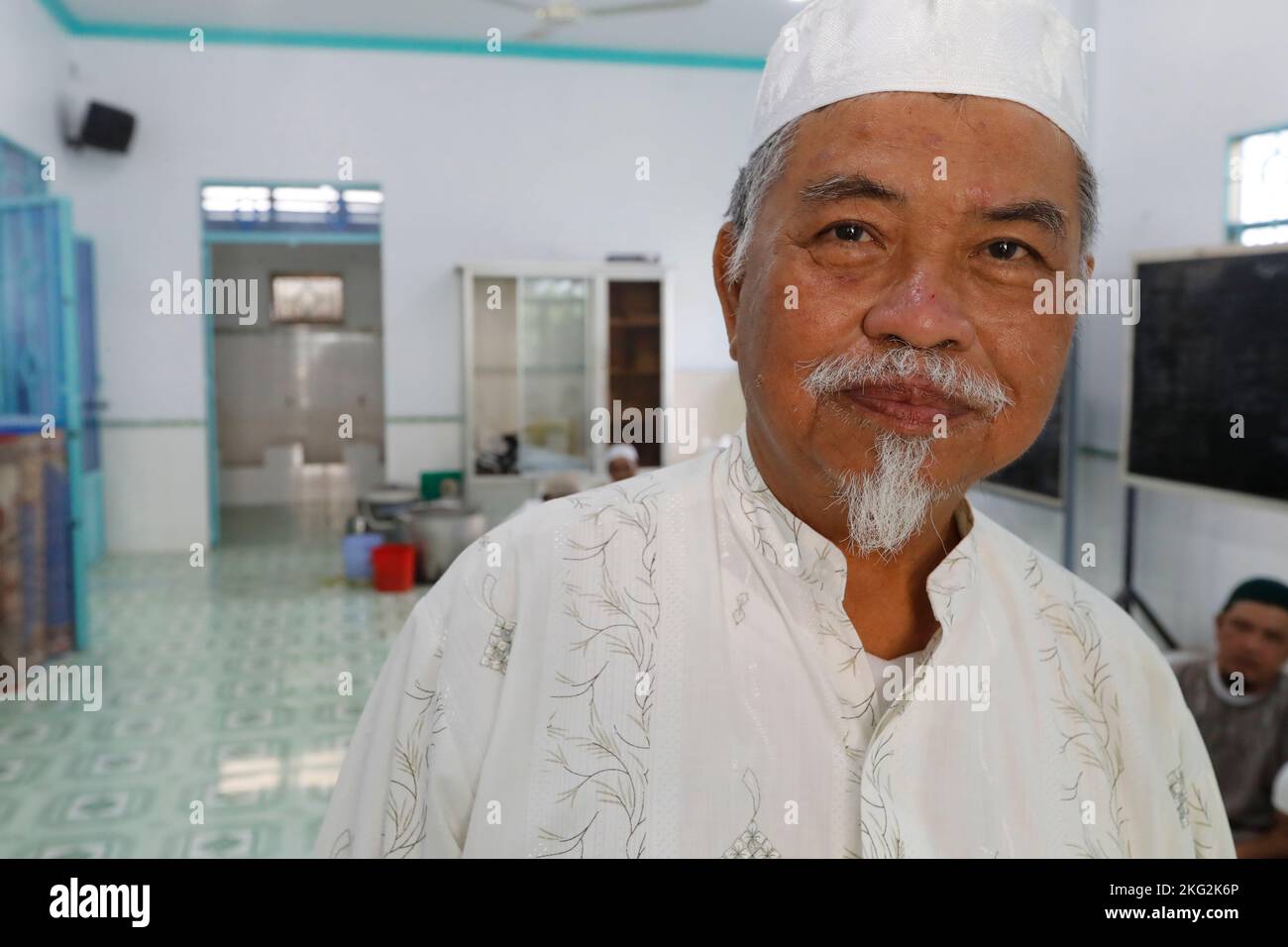 Portrait of smiling muslim man. Chau Doc. Vietnam Stock Photo - Alamy