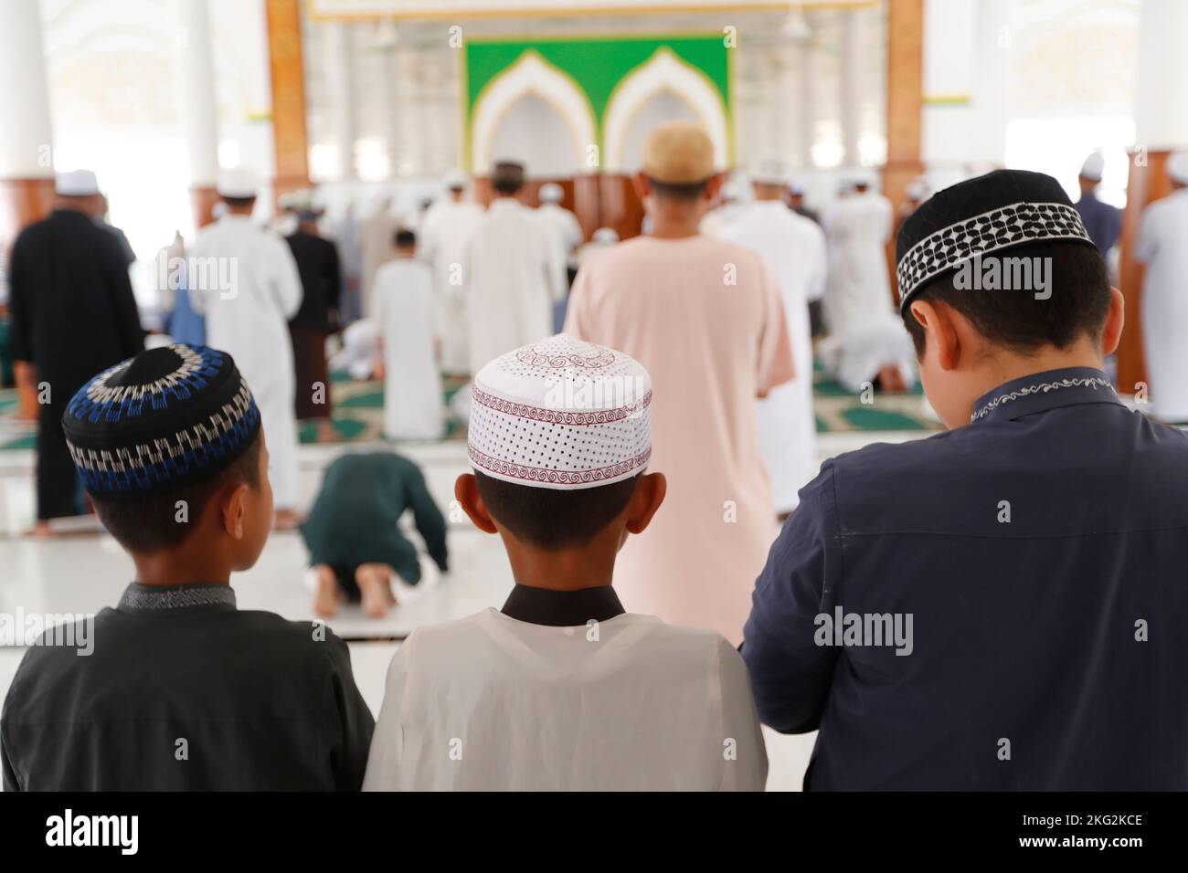 The friday prayer (salat). Muslim men praying in mosque. Chau Doc ...