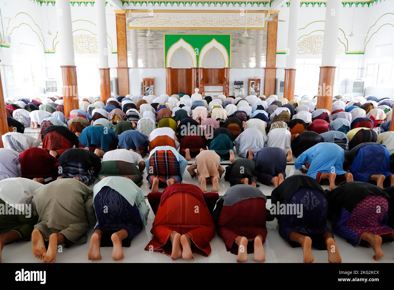 The friday prayer (salat). Muslim men praying in mosque. Chau Doc ...