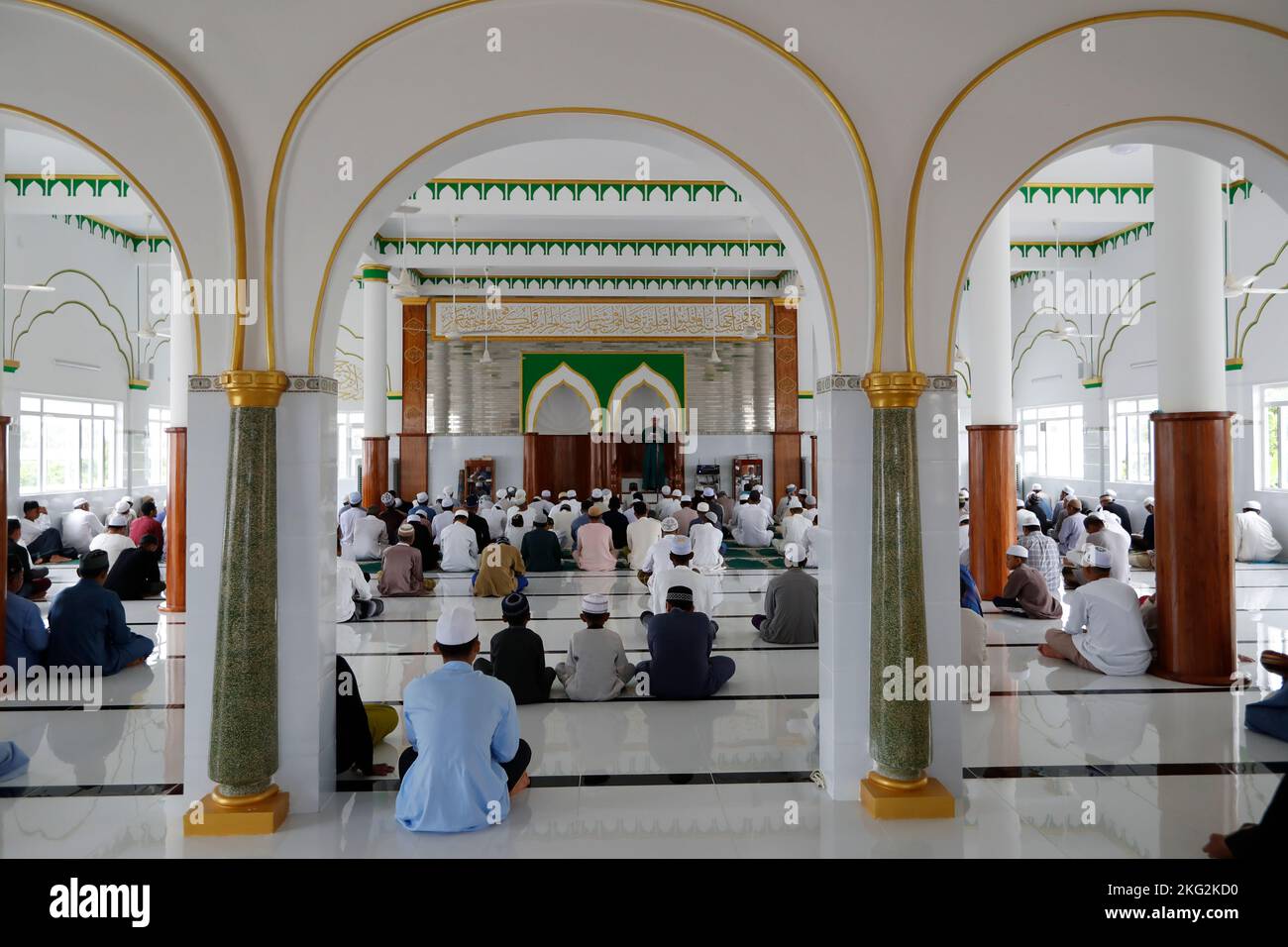 The friday prayer (salat). Muslim men praying in mosque. Chau Doc ...