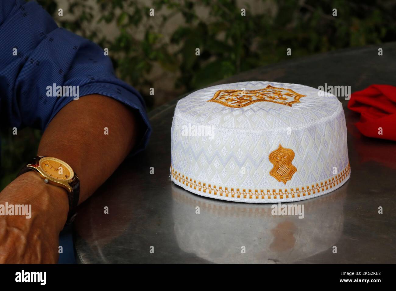 White Muslim Kufi on a table. Chau Doc. Vietnam Stock Photo - Alamy