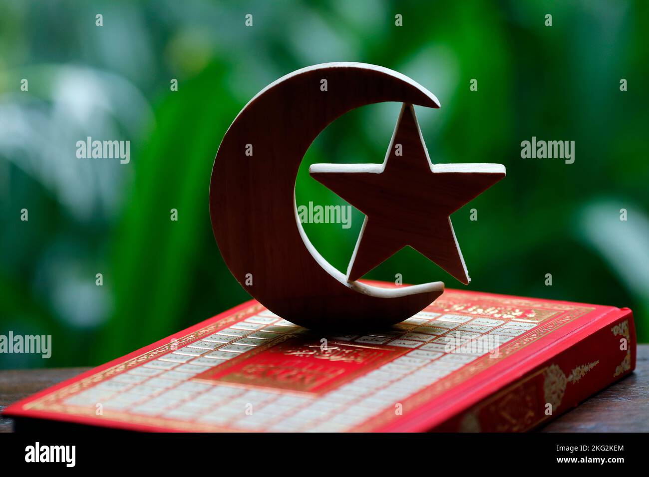Holy Quran with islam crescent and star. Islamic symbol Stock Photo - Alamy