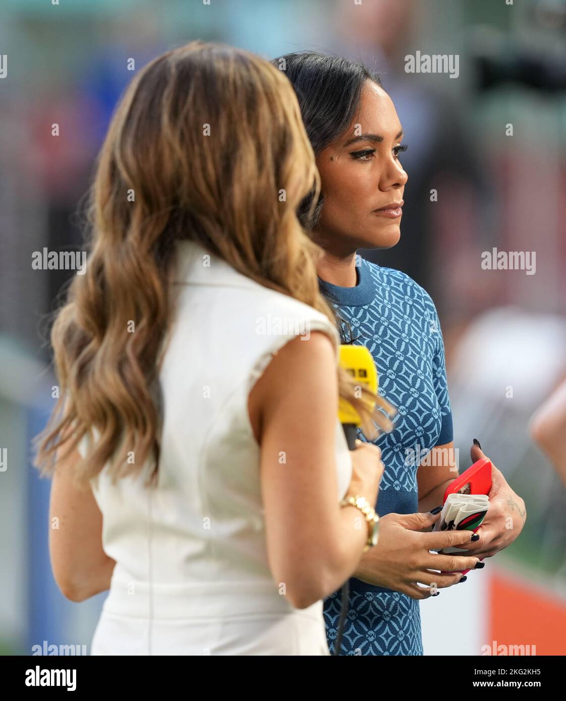 BBC presenter Alex Scott (right) holding the OneLove armband before the ...