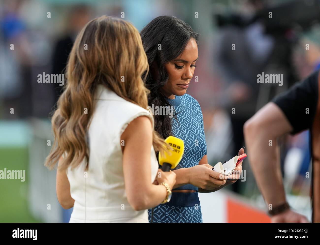 BBC presenter Alex Scott (right) holding the OneLove armband before the ...