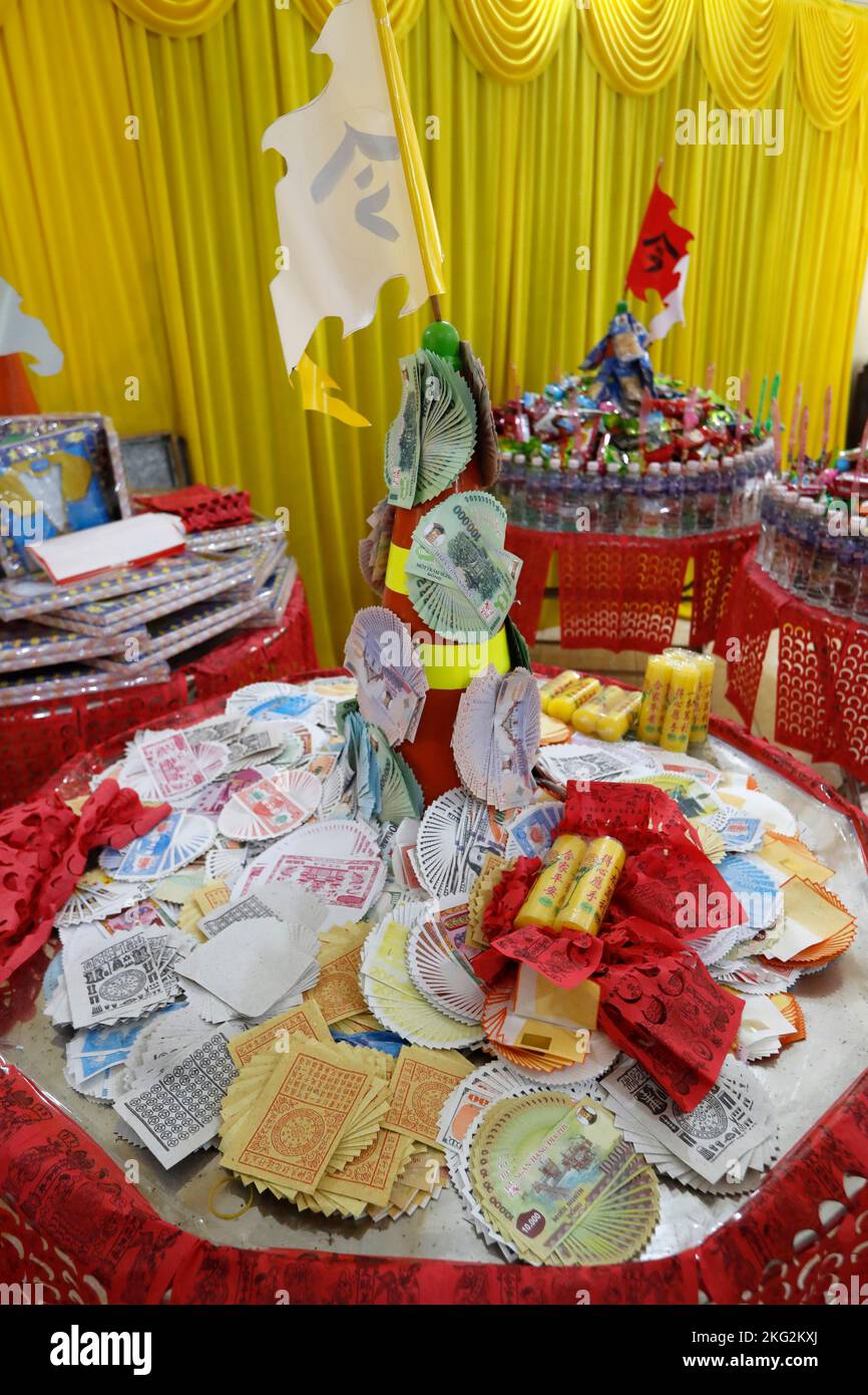 Phuoc Long buddhist temple. Burning hell bank notes and other forms of ...