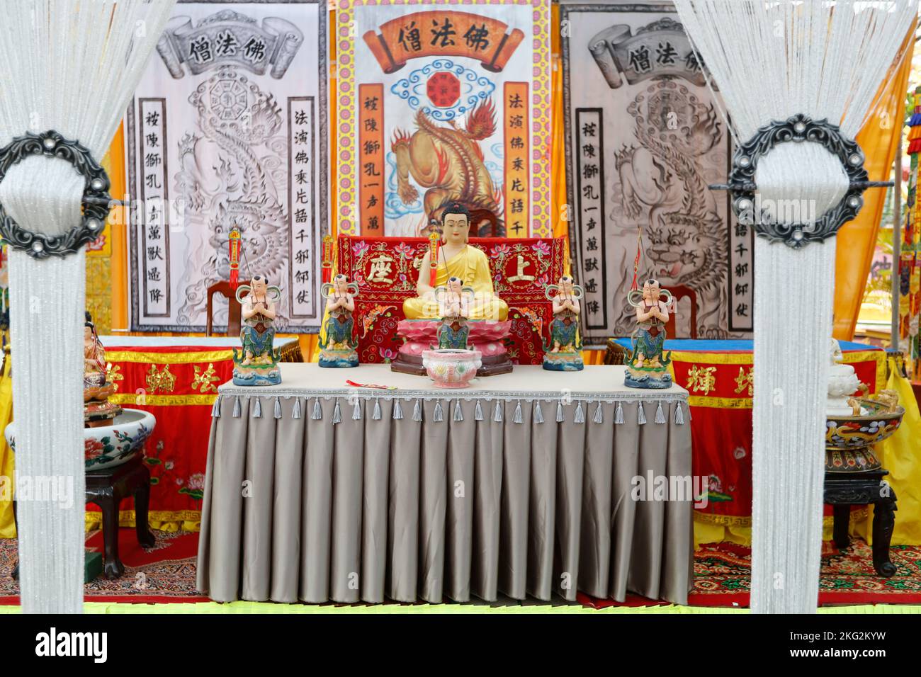 Phuoc Long buddhist temple. Buddha sitting in the meditation pose ...