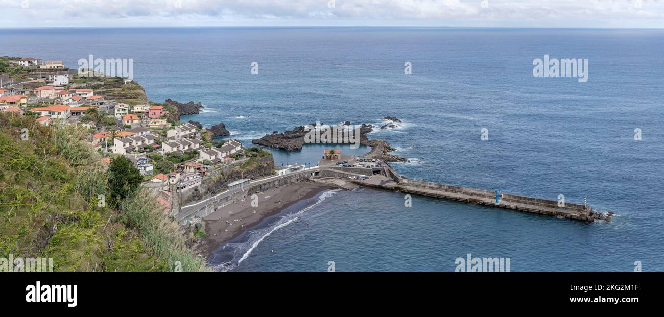 landscape with picturesque village and harbor on northern Atlantic ...