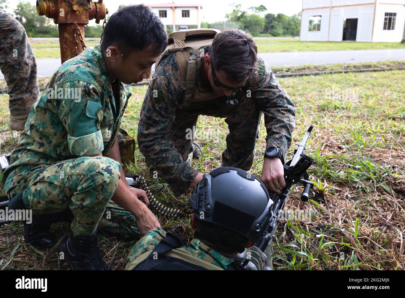 U.S. Marine Corps Staff Sgt. Shane McDaniel, center, a force ...