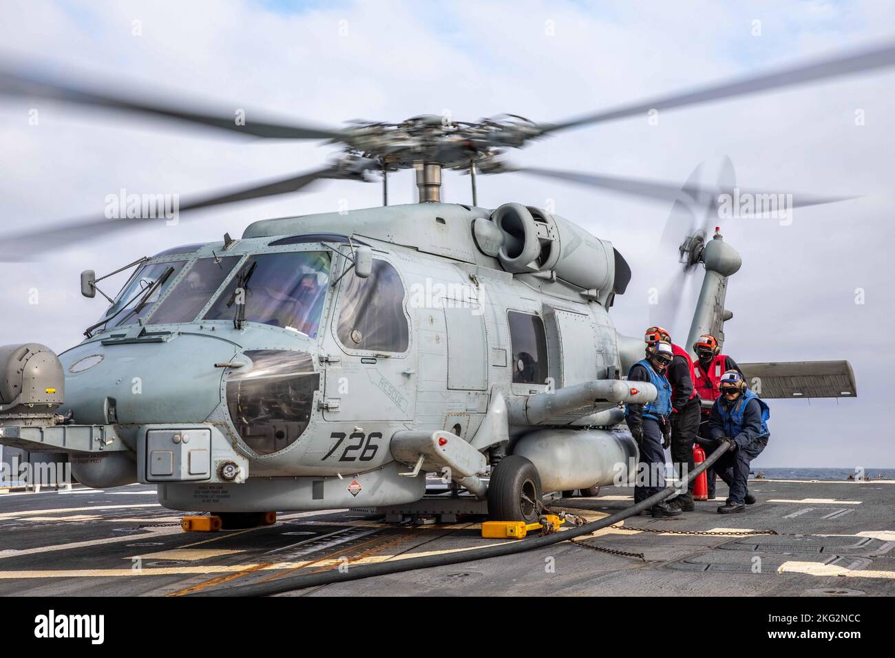 BALTIC SEA (Oct. 25, 2022) Sailors conduct a hot pump refueling on a MH ...