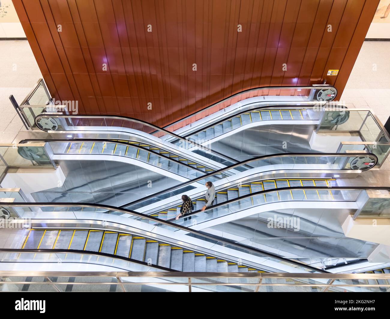 Commuters using the escalators to their next destination in the ...