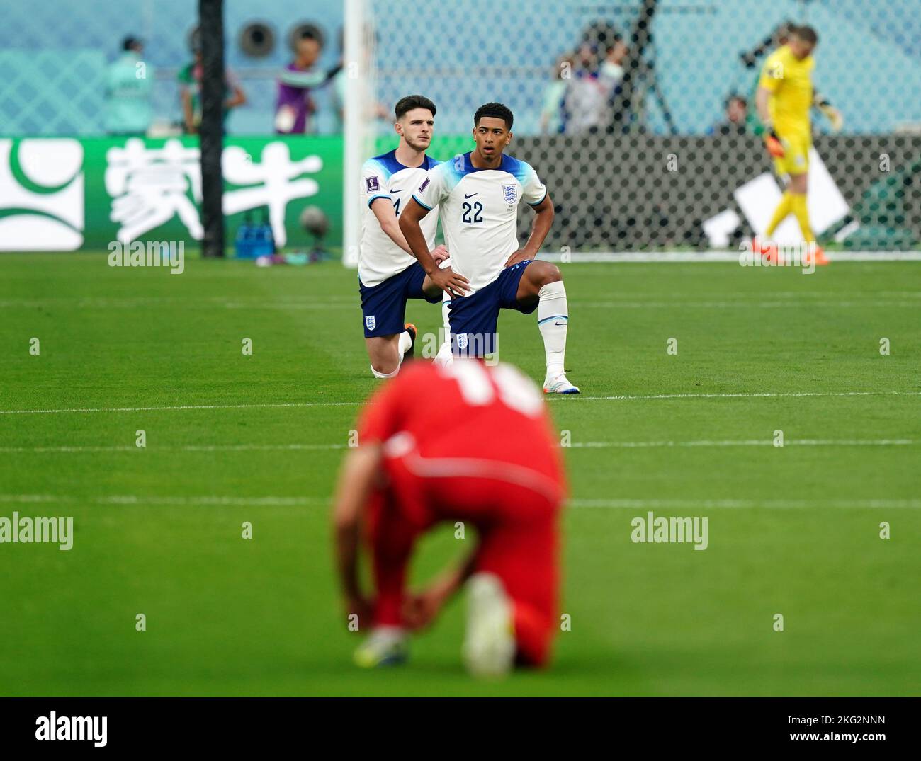 England's Declan Rice and Jude Bellingham take a knee ahead of the FIFA ...