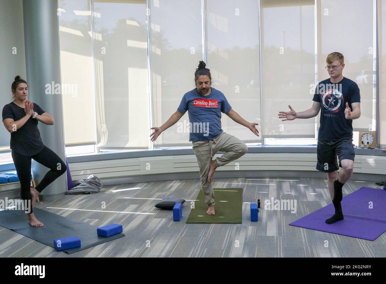 Alejandro Godinez, a yoga instructor, leads Soldiers from the 22nd ...