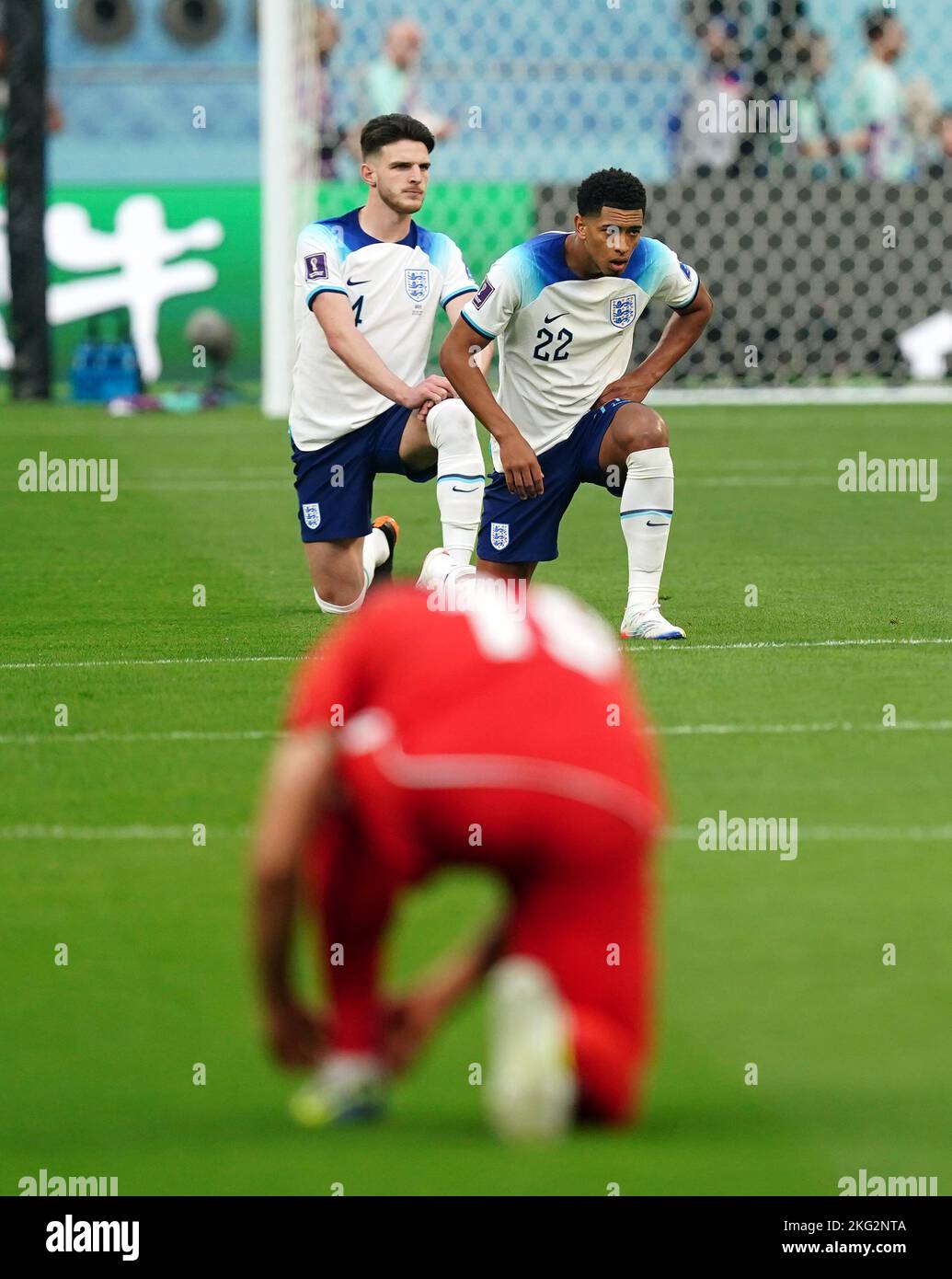 England's Declan Rice and Jude Bellingham take a knee ahead of the FIFA ...