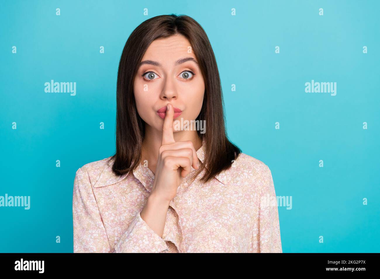 Close up photo of nice young woman finger touch lips keep secret ...