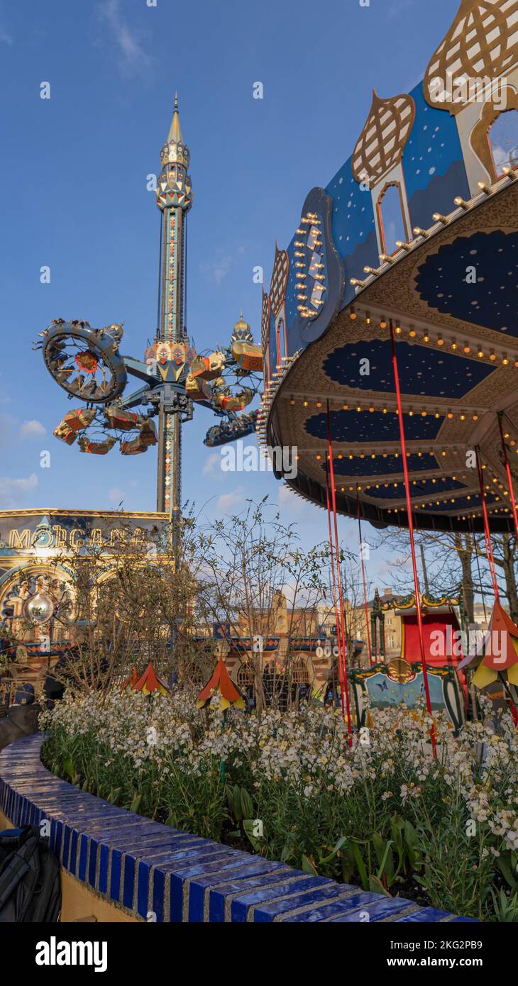 A vertical shot of the beautiful Tivoli amusement park in Copenhagen ...