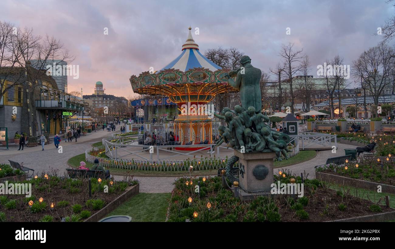 The beautiful Tivoli amusement park at sunset in Copenhagen, Denmark ...