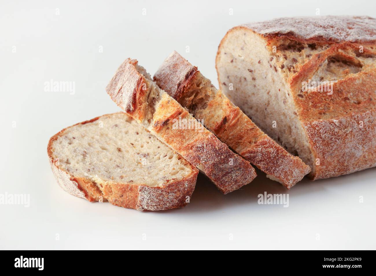 Sliced loaf of bread isolated on white Stock Photo - Alamy