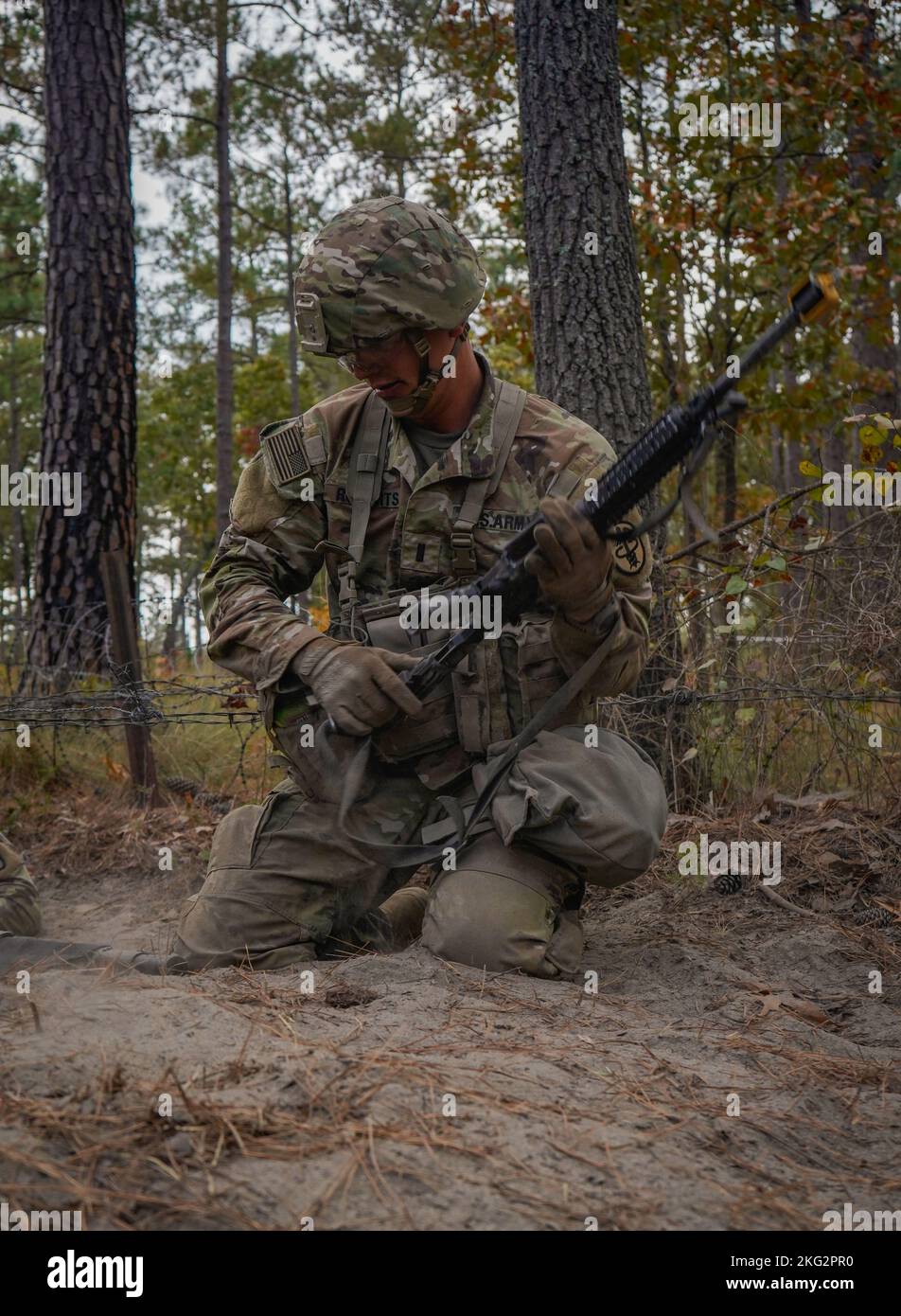 A competitor assigned to the U.S. Army Medical Command guides his team ...