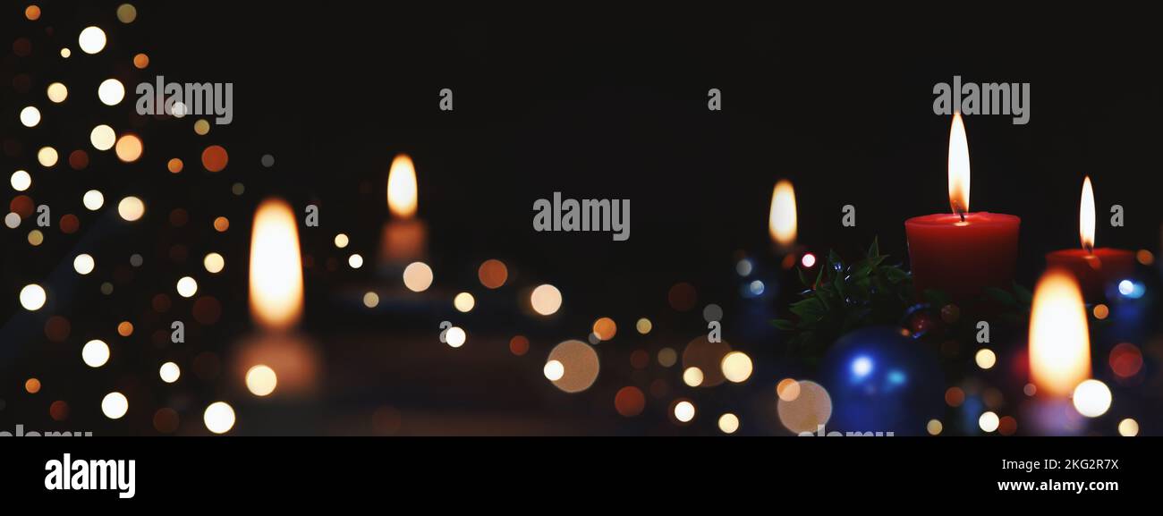 Sparkling church Christmas tree decorations, brightly lit candles and ...