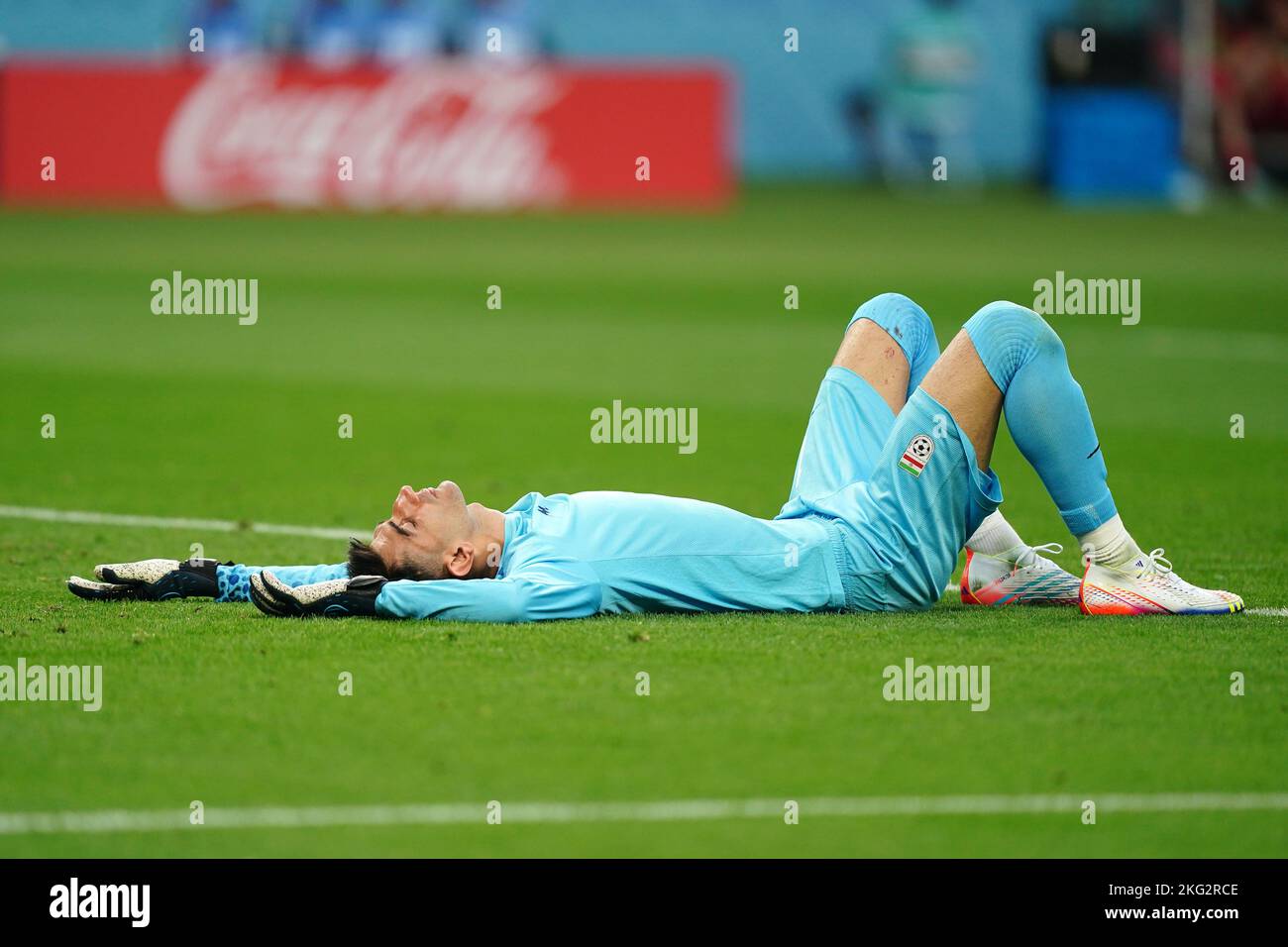 Iran goalkeeper Alireza Beiranvand reacts after picking up an injury ...