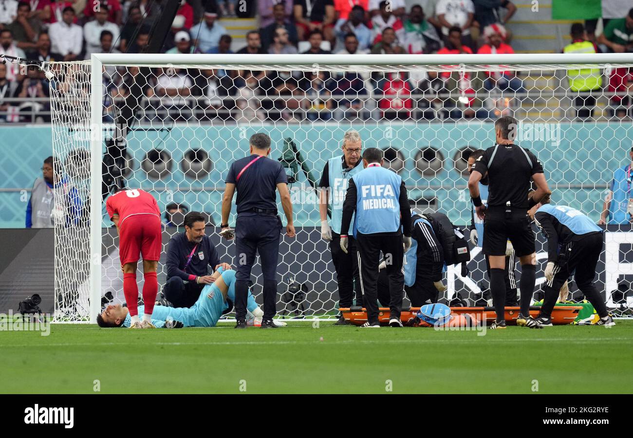 Iran goalkeeper Alireza Beiranvand receives treatment for an injury ...