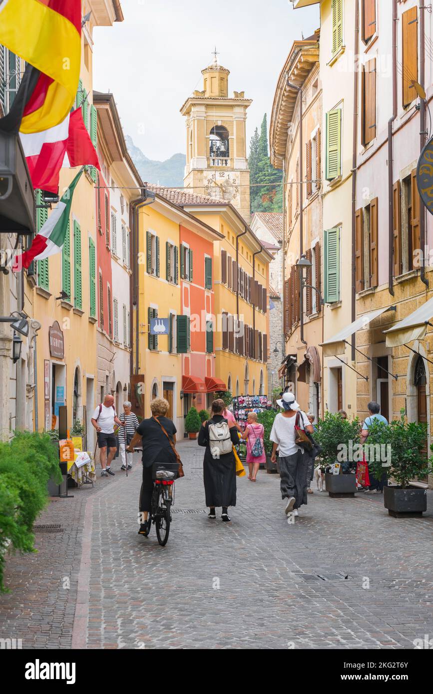 Italian Lakes town, view in summer of people walking in the Via Roma in ...