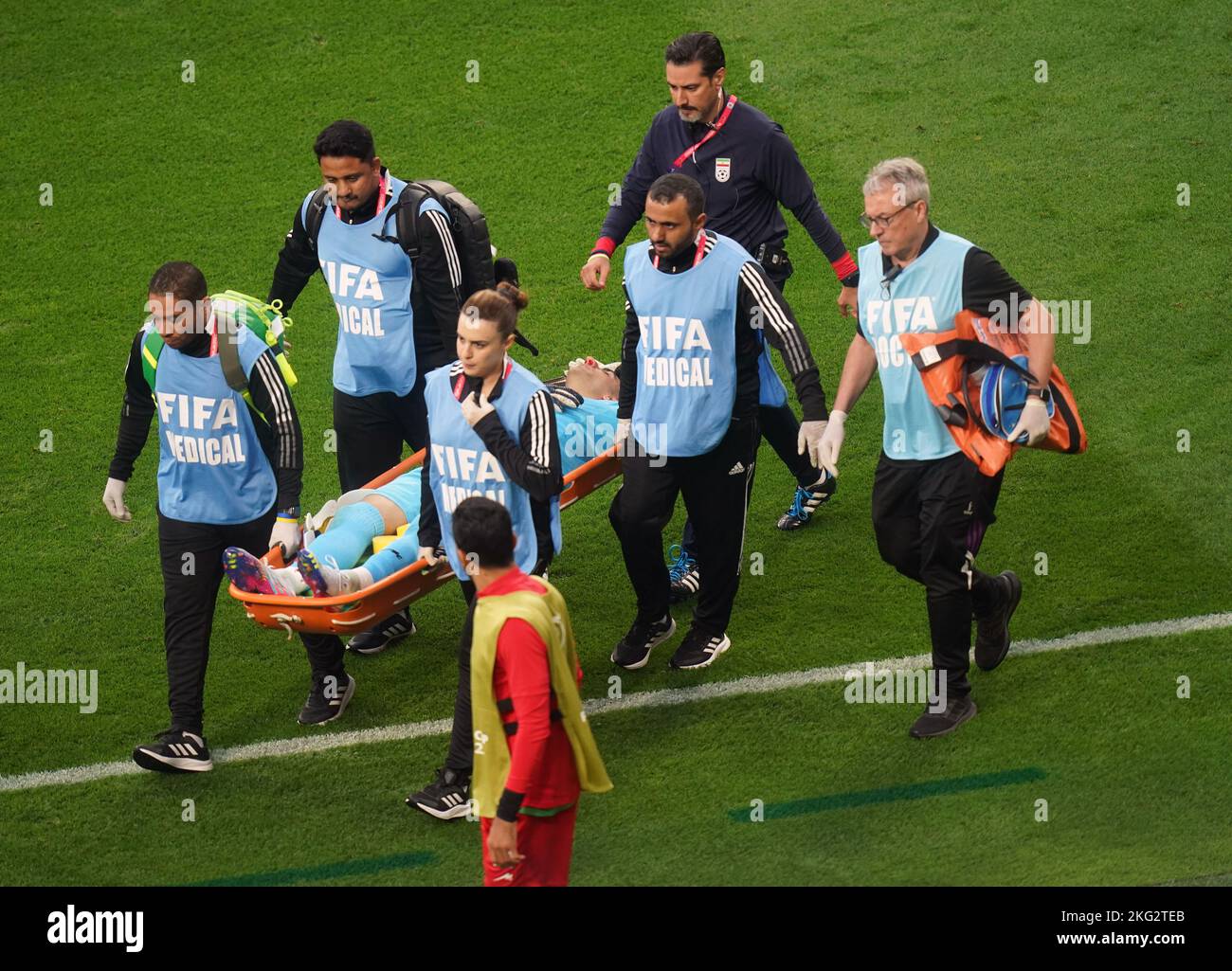 Iran goalkeeper Alireza Beiranvand is carried off injured during the ...