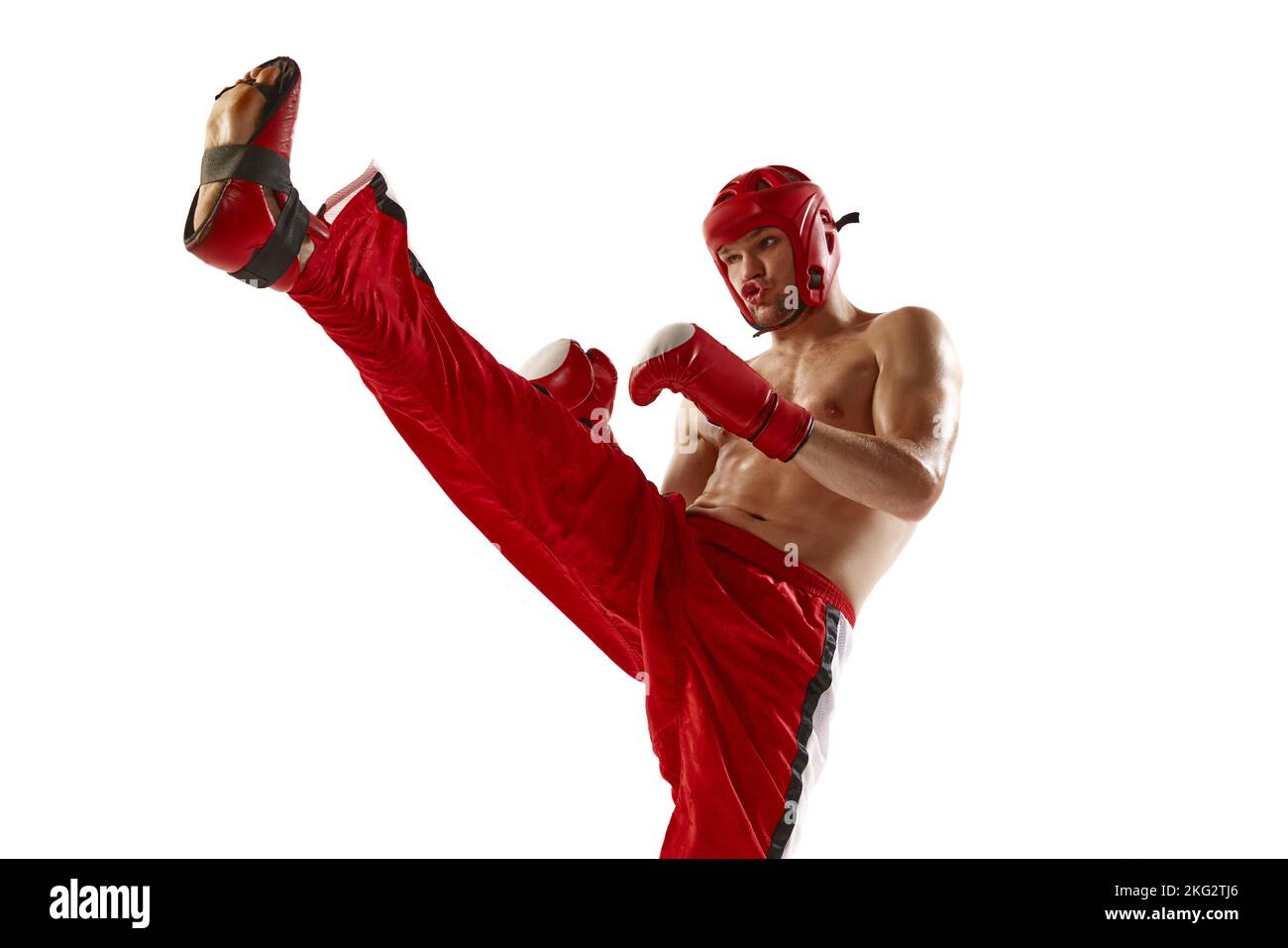 Dynamic portrait of young muscled athlete, professional kickboxer in ...