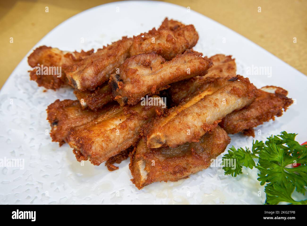 A delicious Chinese dish, Garlic Fried Pork Ribs Stock Photo - Alamy