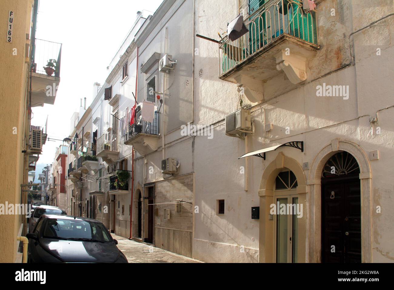 Narrow street between adjoined buildings in the historical center of ...