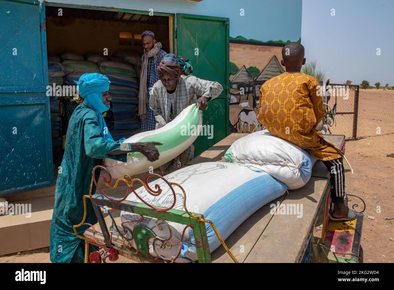 Loading of livestock food by members of a dairy farmers' cooperative in ...