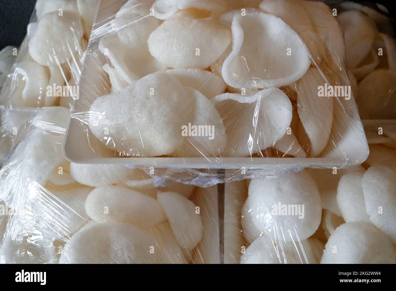 Krupuk or Chinese traditional chips. Junk food or fastfood concept ...