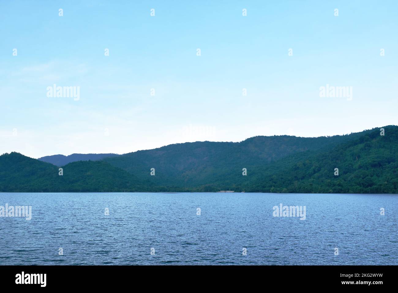landscape of water reservoir lake with mountain background in sunset ...