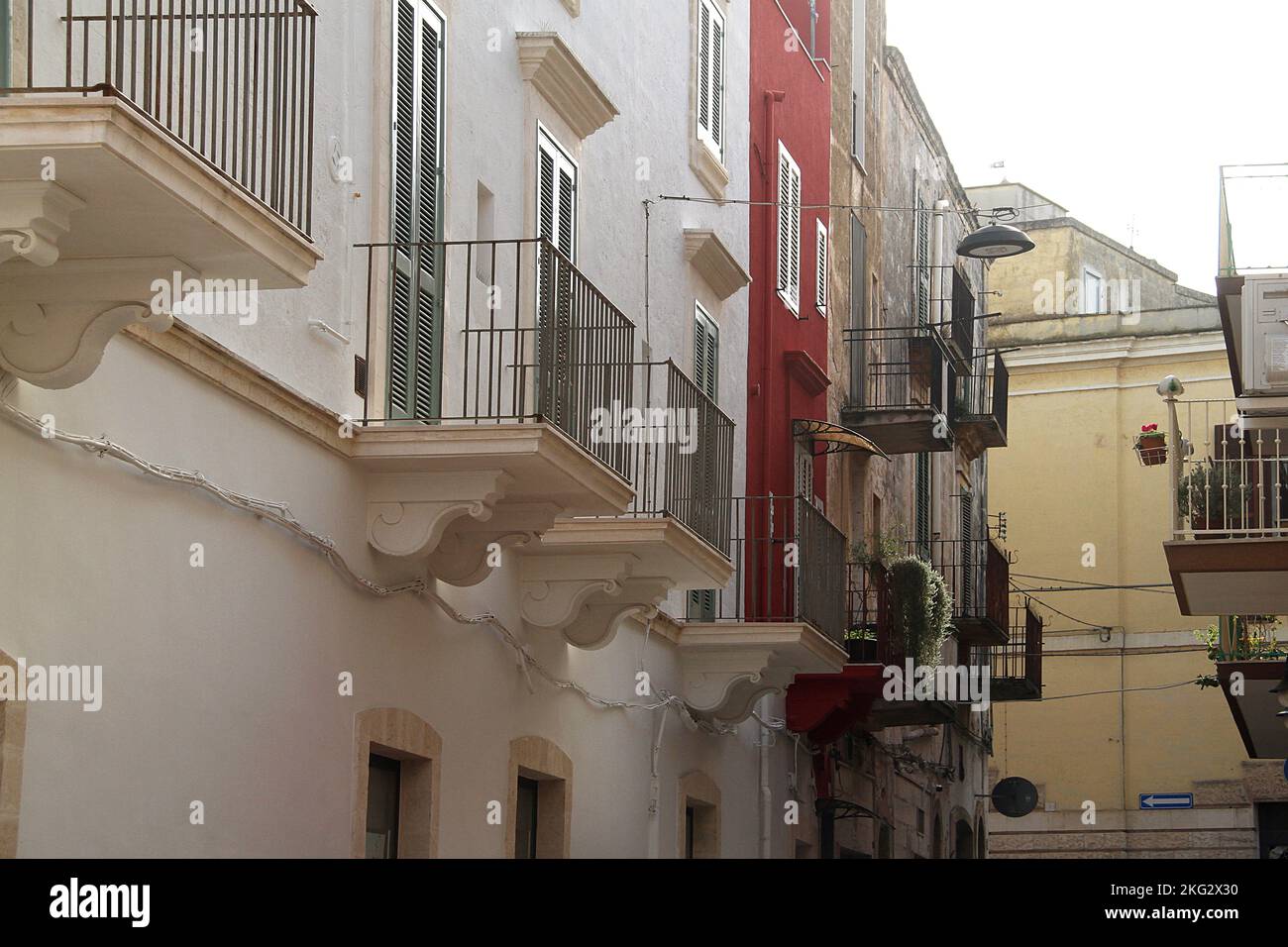 Adjoined buildings with small balconies in the historical center of ...