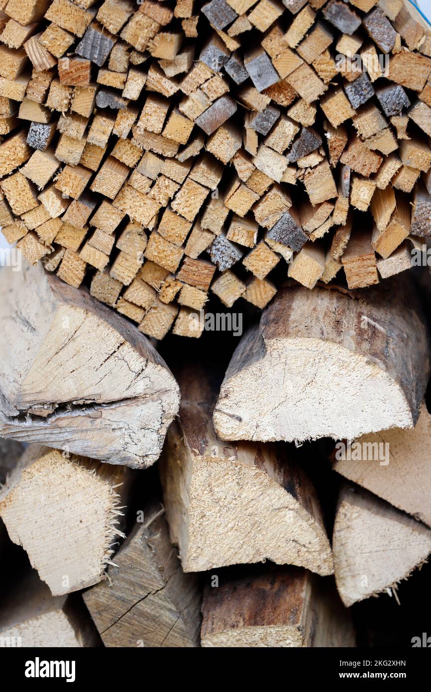 Fire wood pile with split logs. France Stock Photo - Alamy