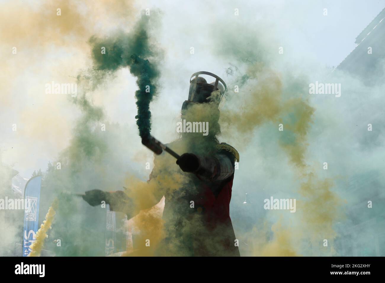 Street artist using colored smoke bombs. France Stock Photo - Alamy