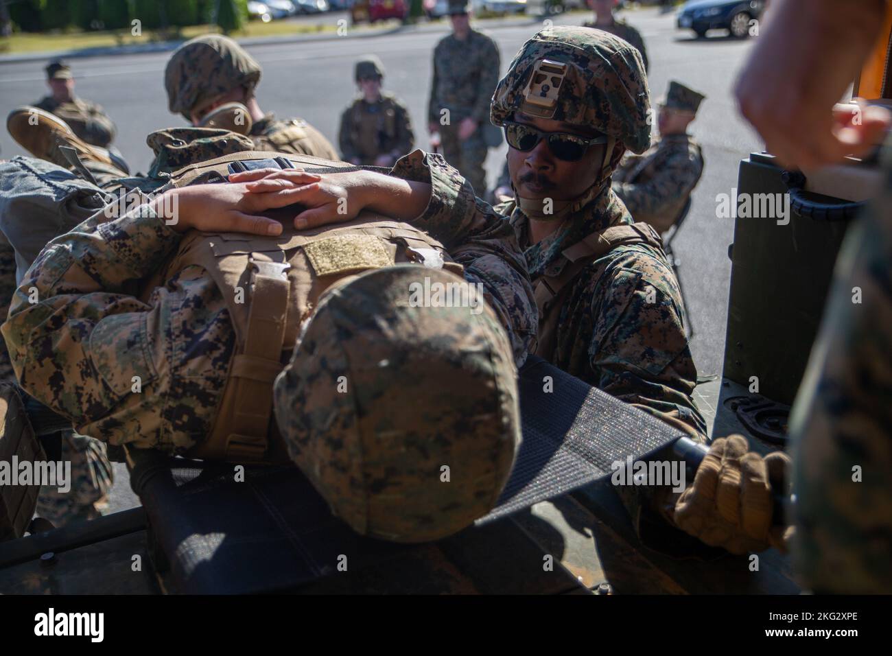 U.S. Navy Hospital Corpsman 3rd Class David Johnson with Marine ...