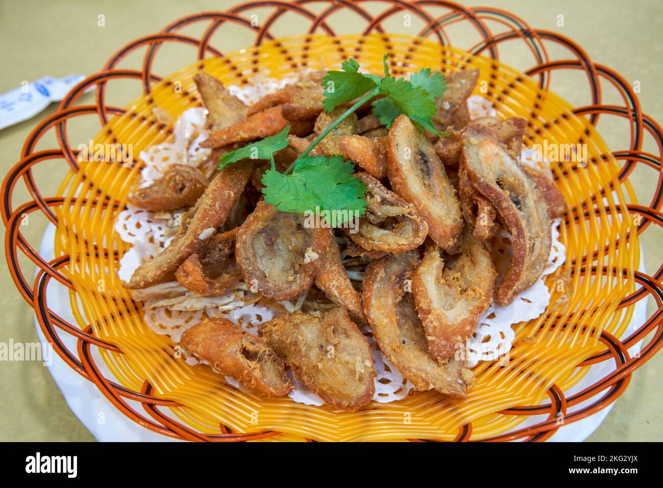 A delicious Chinese dish, fried seven-inch fatty intestines Stock Photo ...