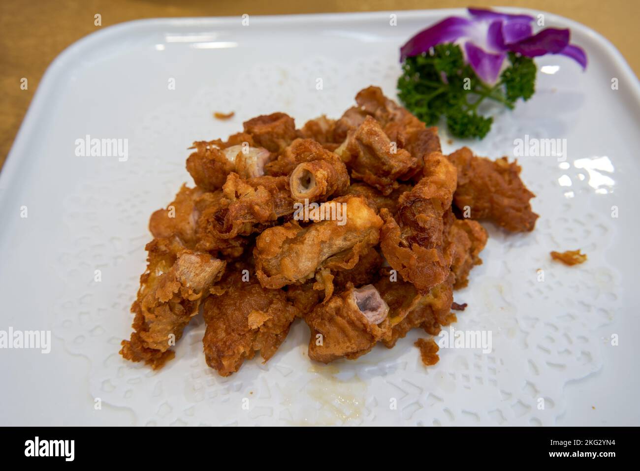 A delicious Chinese dish, fried pig small intestines Stock Photo - Alamy