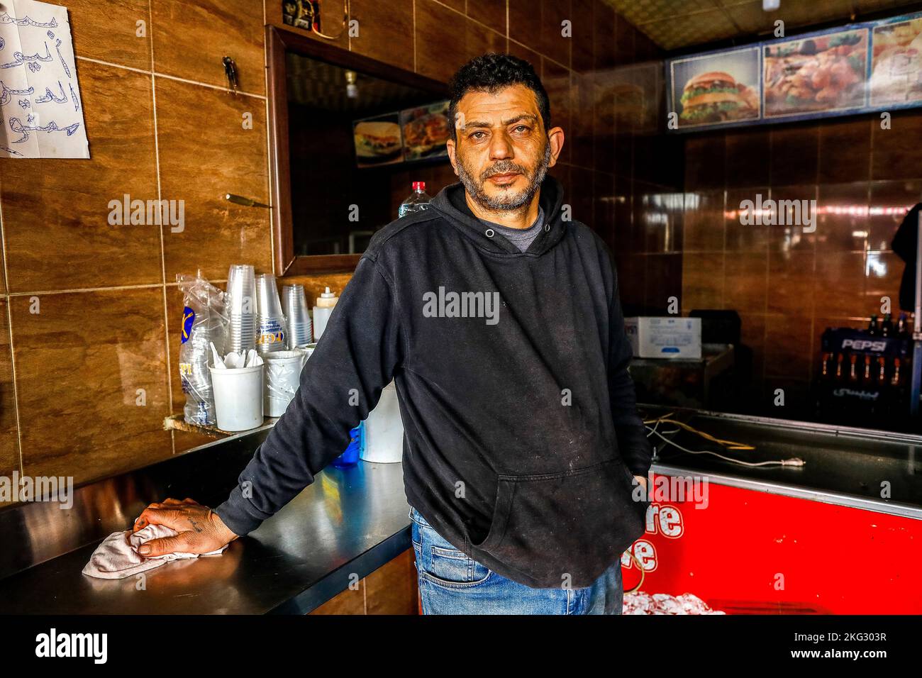 Palestinian cafe owner in Shatila camp, Beirut, Lebanon Stock Photo - Alamy