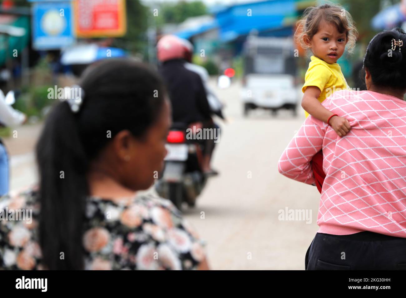 Daily life. Cambodian mother and child living in a poor district ...